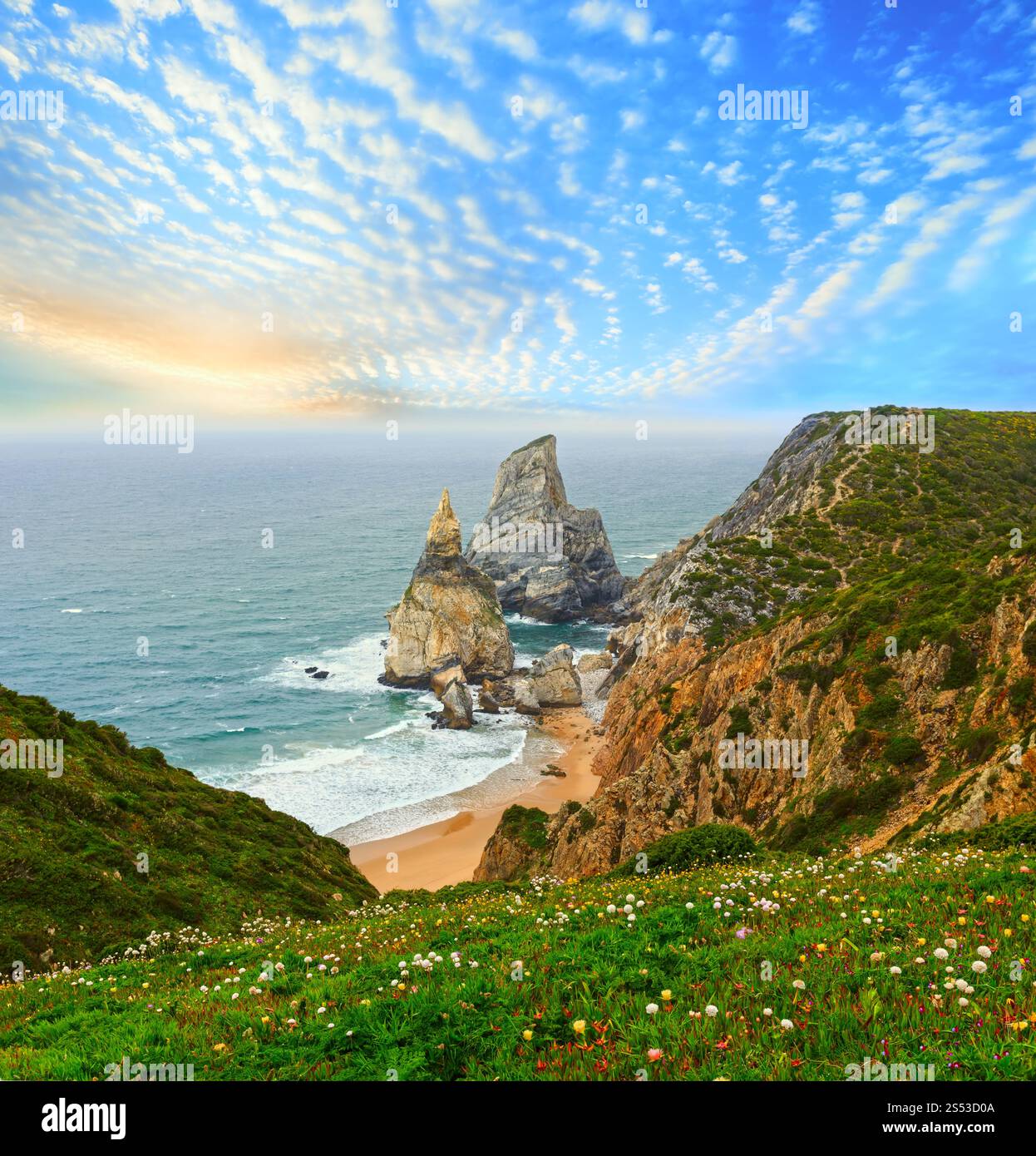 Sunset Atlantic ocean coast with granite boulders and sea cliffs ...