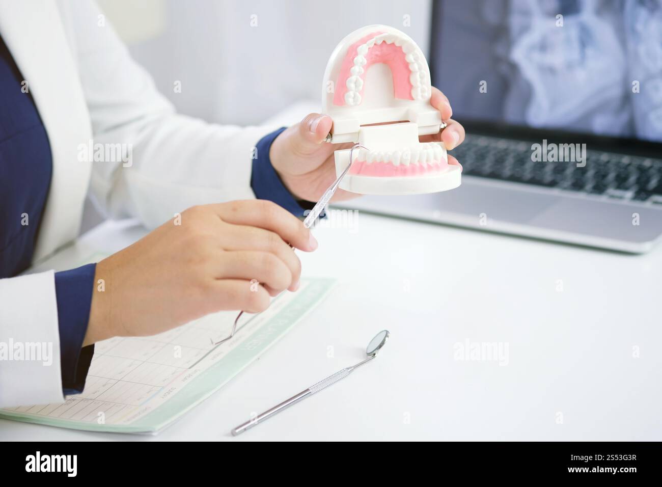 Dentist examining a patient teeth medical treatment at the dental ...