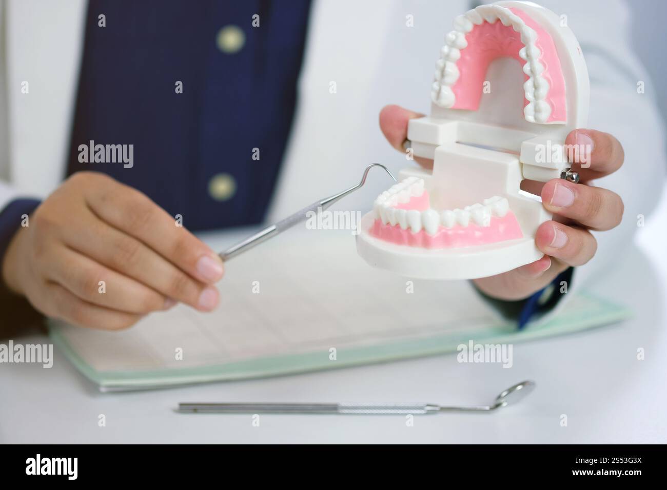 Dentist examining a patient teeth medical treatment at the dental ...