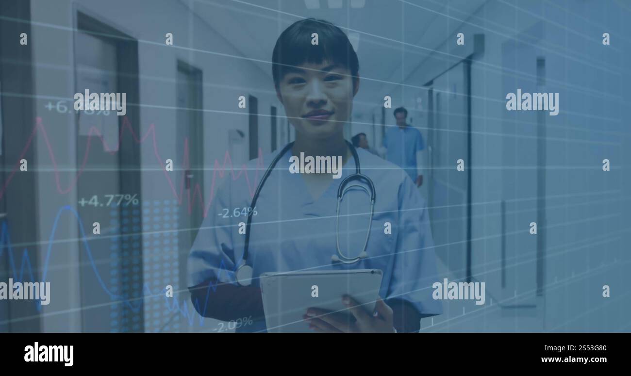Doctor monitoring metrics in hospital hi-res stock photography and ...