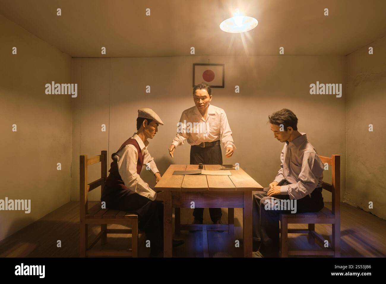 A recreation of a questioning, interrogation session in a windowless ...