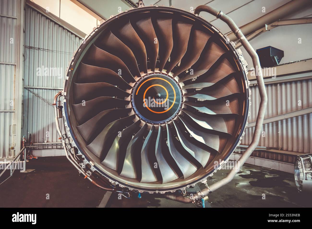 Airplane engine maintenance in airport hangar. Closeup view. Airplane ...