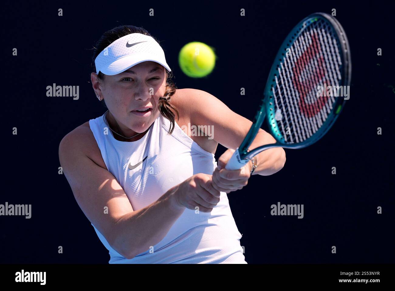 Amanda Anisimova of the U.S. plays a backhand return to Maria Lourdes ...