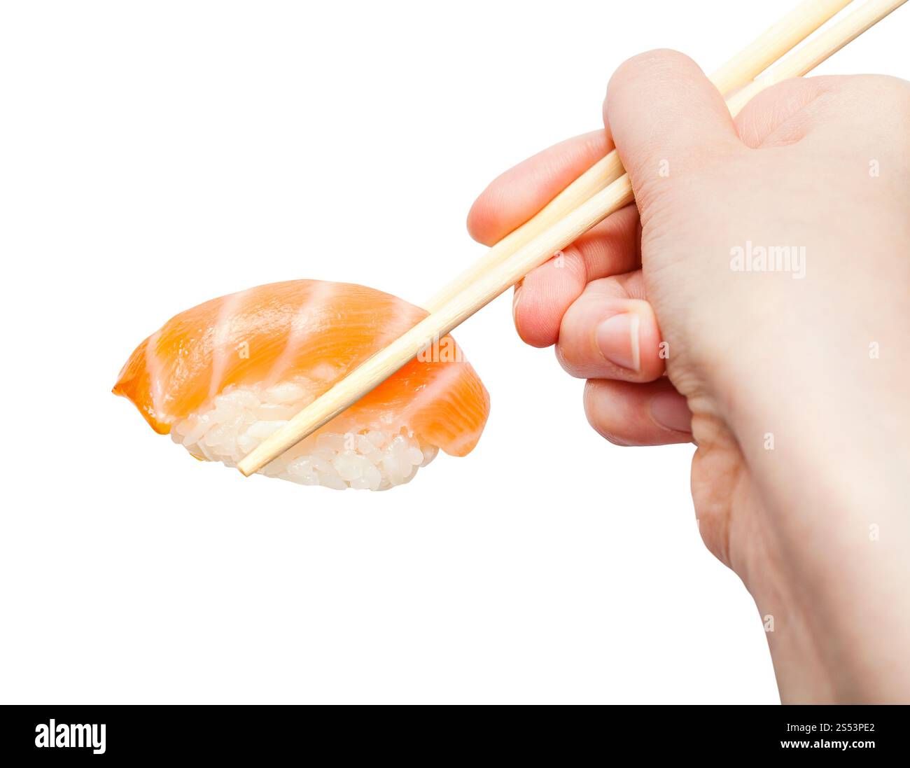 female hand with disposable chopsticks holds sake nigiri sushi with salmon close up isolated on ...