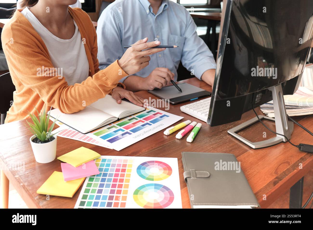 Graphic designer working on digital tablet. artist drawing on graphic ...