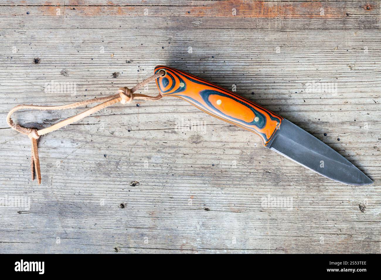 top view of handcrafted blackened steel knife with homemade epoxy and ...