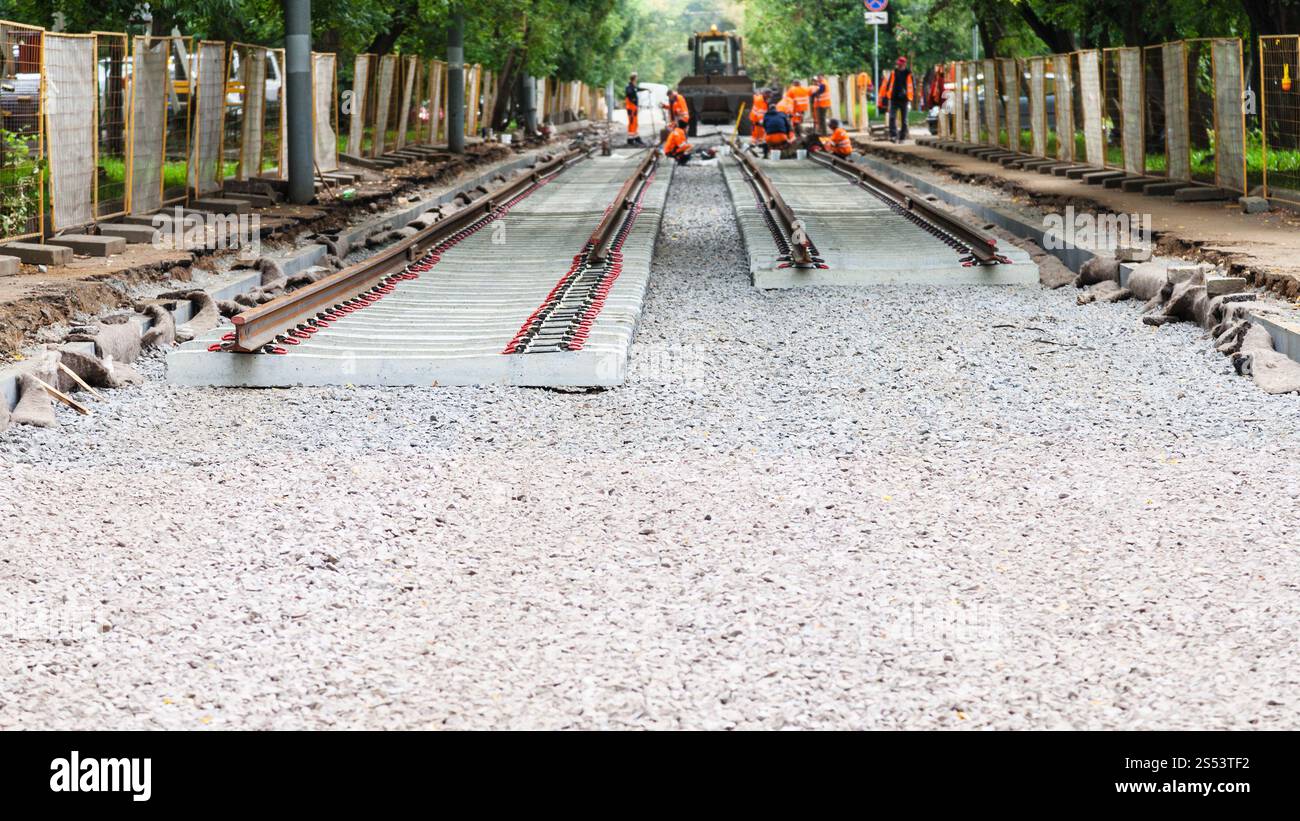 repair of tram tracks in Moscow city - laying of new rails of tramroad ...