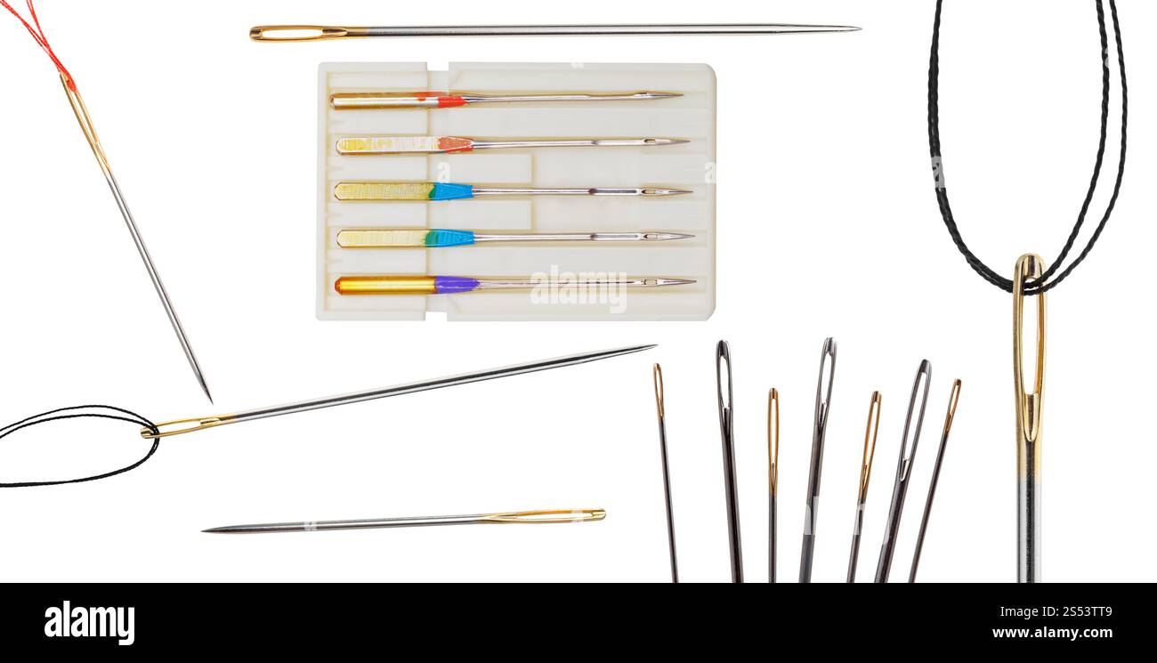 collection of various sewing needles close up isolated on white ...