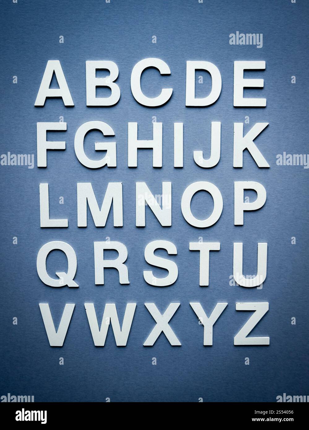 Alphabet made with solid letters. top view photo. Alphabet made with ...