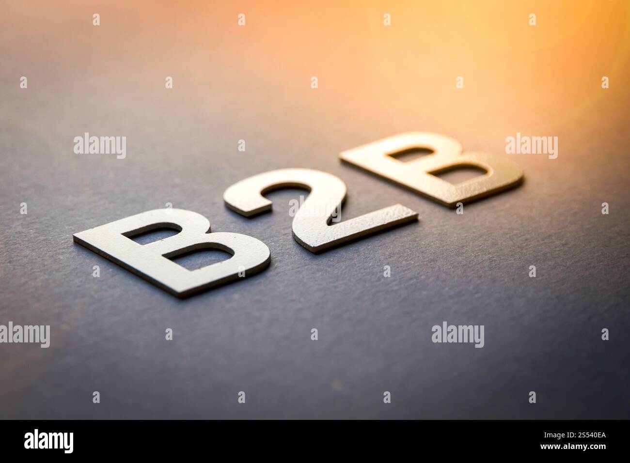 Word B2B written with white solid letters on a board. Word B2B written ...