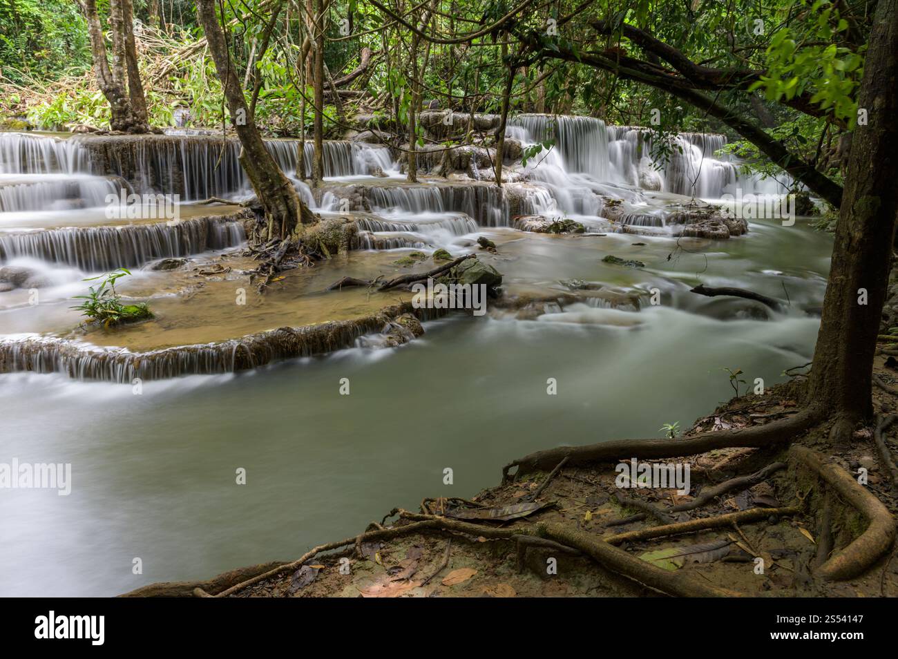 Waterfall that is a layer in Thailand Stock Photo - Alamy