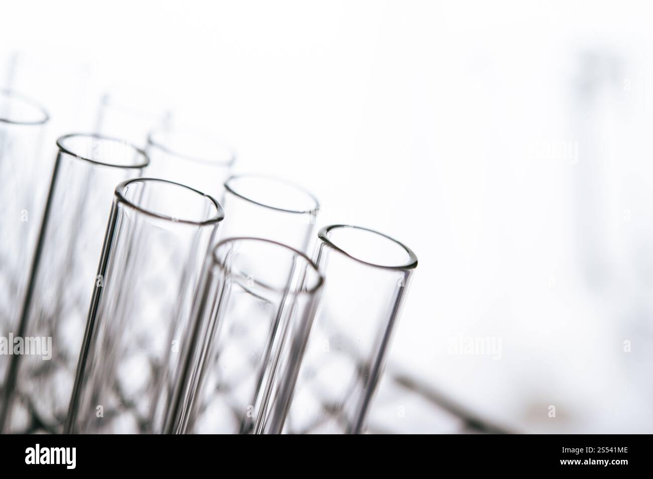 Science tubes arranged on the shelf Stock Photo - Alamy