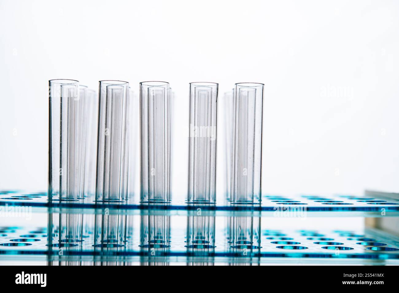 Science tubes arranged on the shelf Stock Photo - Alamy