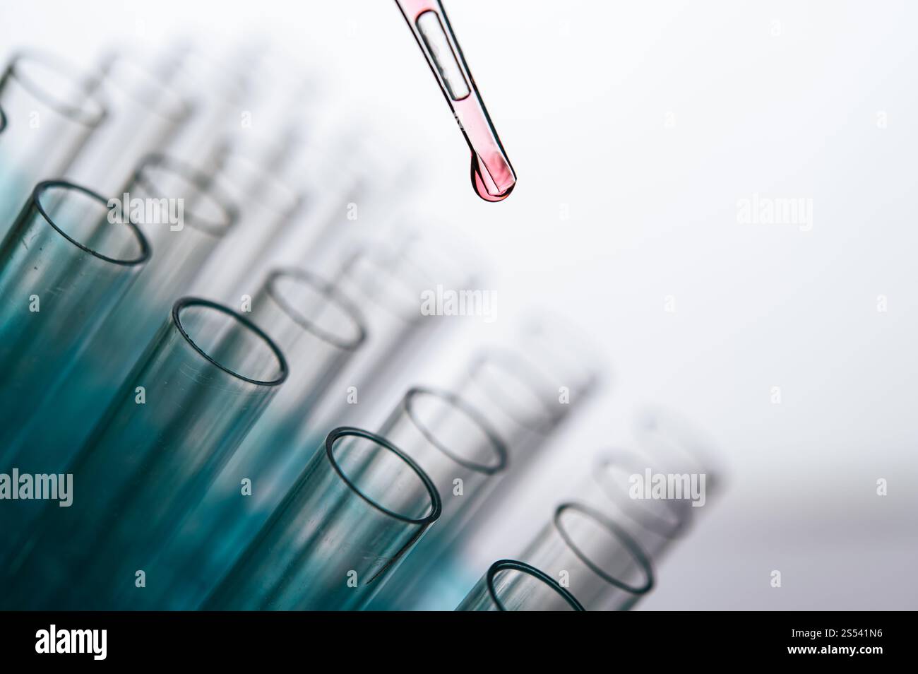 Dropper pink liquid hi-res stock photography and images - Alamy