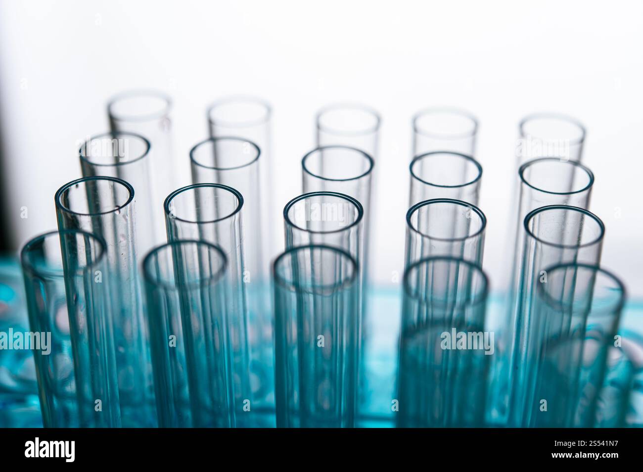 Science tubes arranged on the shelf Stock Photo - Alamy