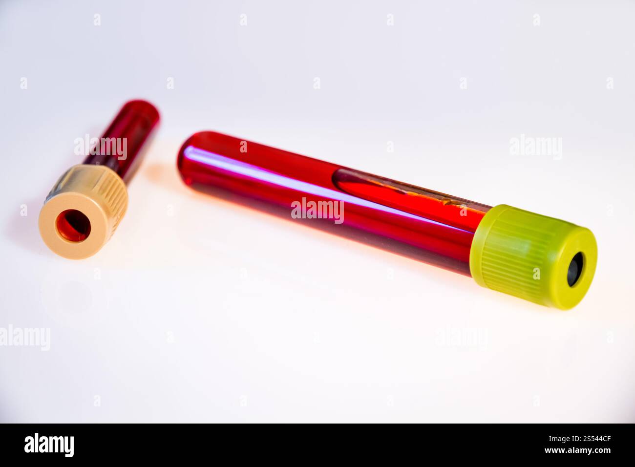 Two blood test tubes isolated on white background. Blood test tubes ...