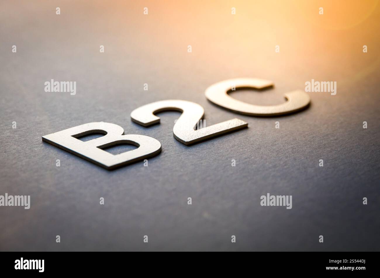 Word B2C written with white solid letters on a board. Word B2C written ...