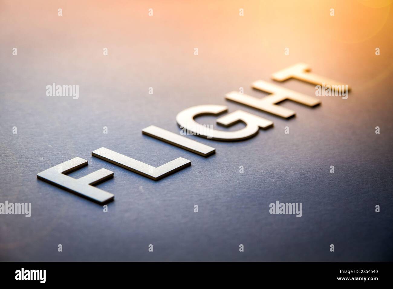Word flight written with white solid letters on a board. Word flight ...