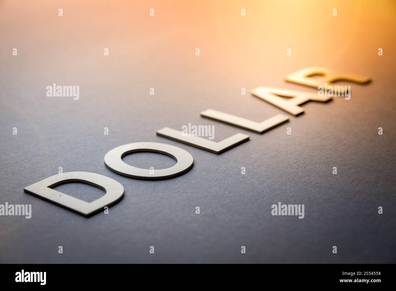 Word dollar written with white solid letters on a board. Word dollar ...