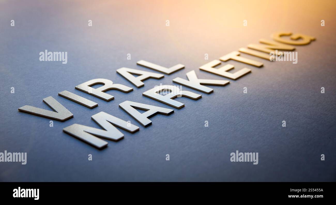 Word viral marketing written with white solid letters on a board. Word ...