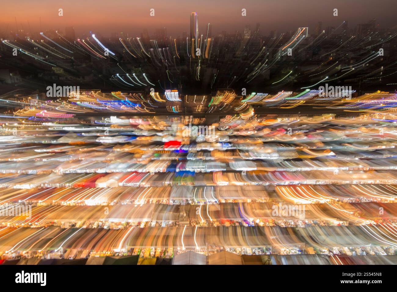 the view of the Ratchada Night market in the city of Bangkok in ...