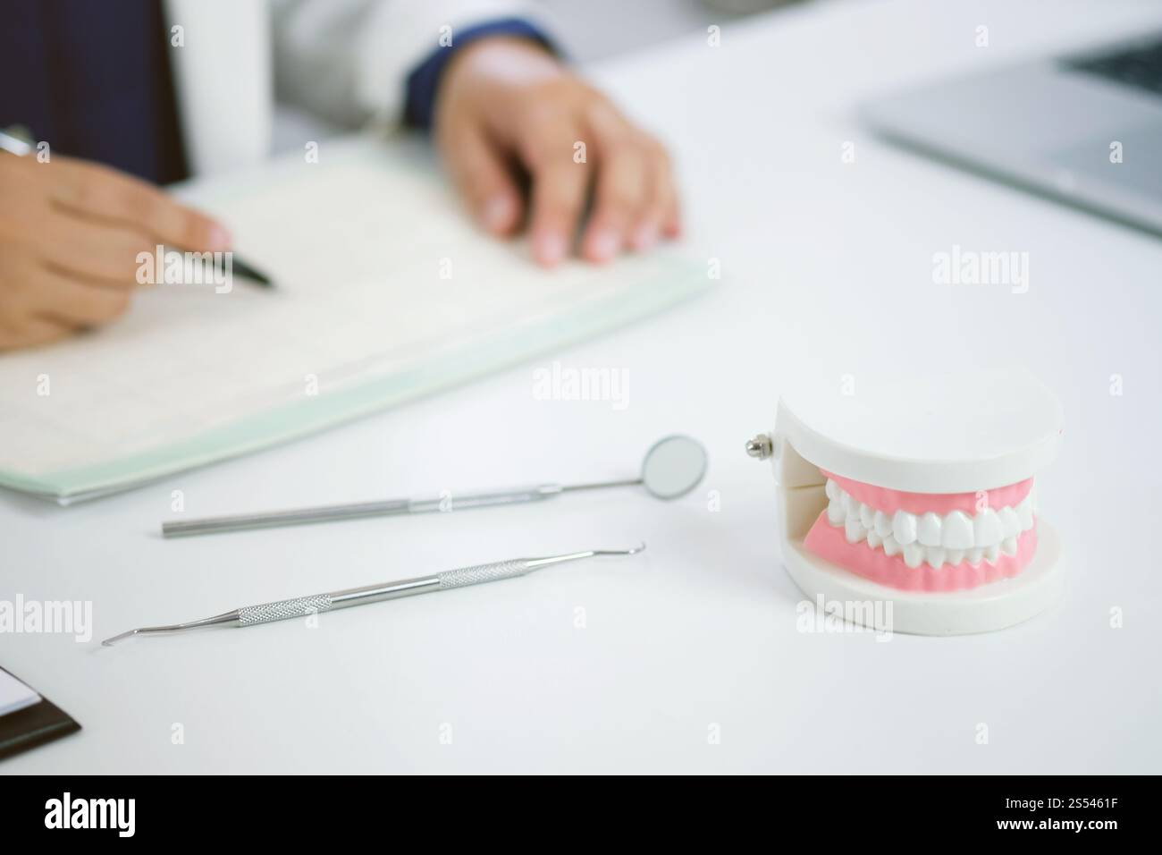 Dentist examining a patient teeth medical treatment at the dental ...
