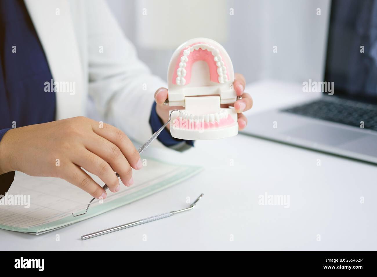 Dentist examining a patient teeth medical treatment at the dental ...