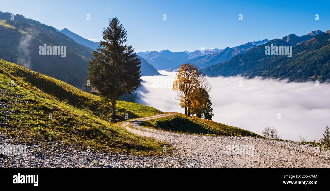Sunny idyllic autumn alpine scene. Peaceful misty morning Alps mountain ...