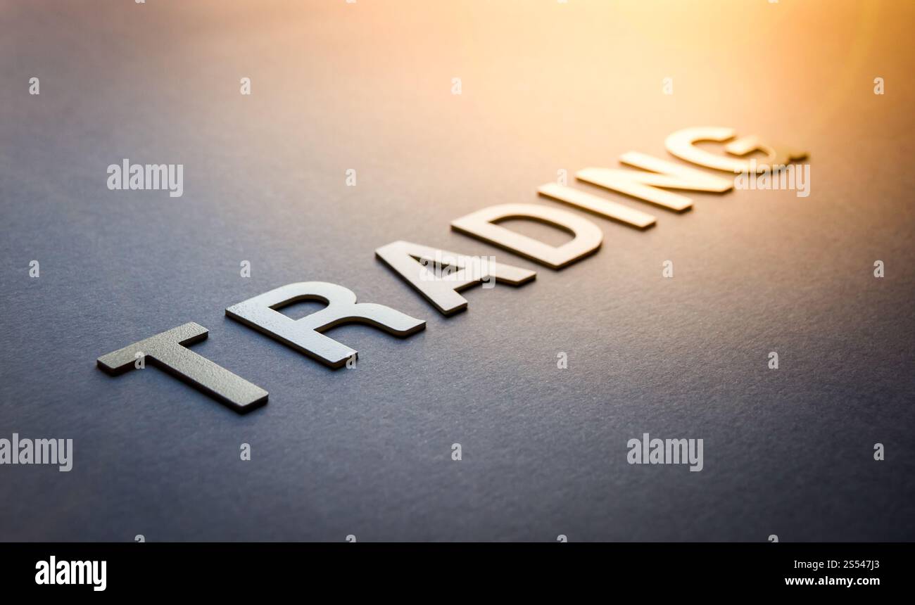 Word trading written with white solid letters on a board. Word trading ...