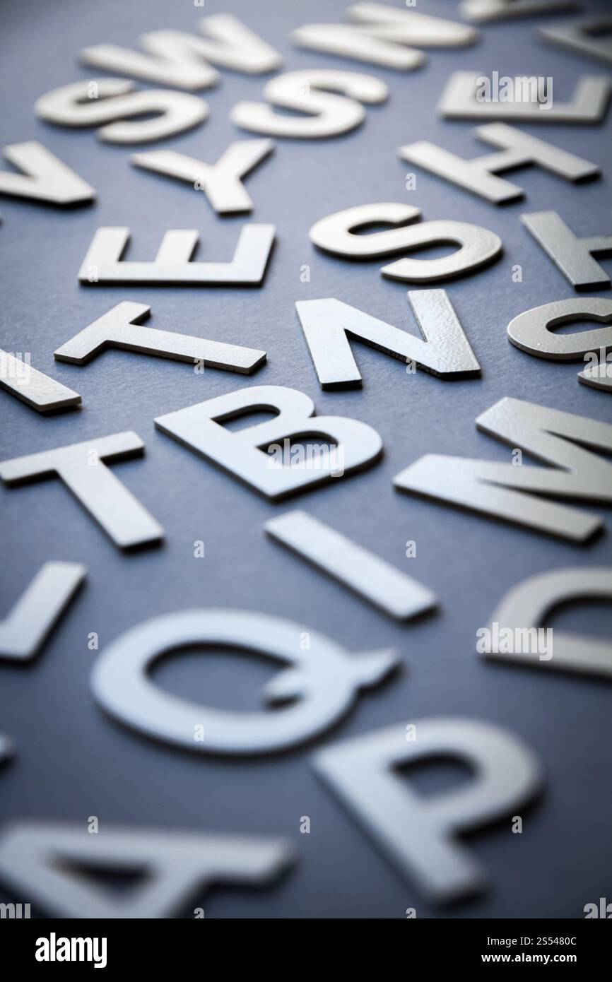 Mixed solid letters pile closeup photo. Education background concept ...