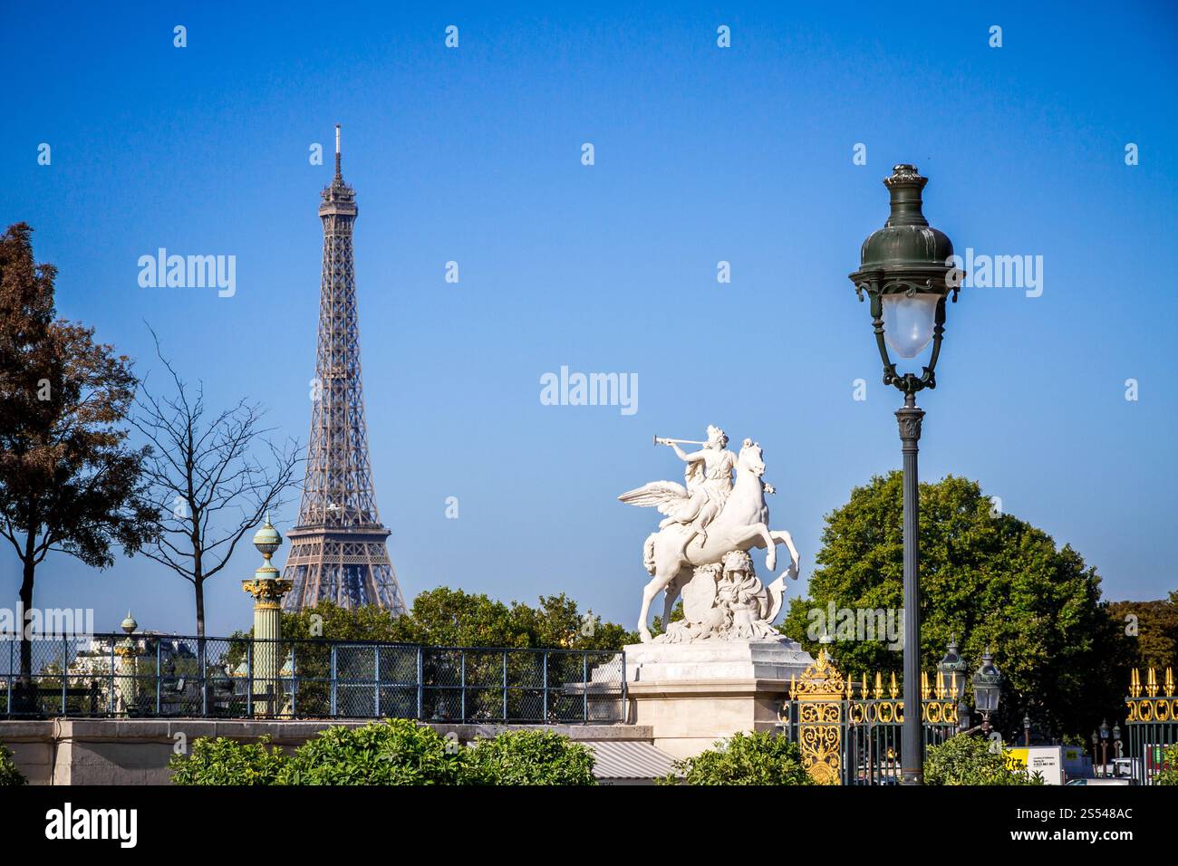 Fame straddling Pegasus statue and Eiffel Tower view from the Tuileries ...