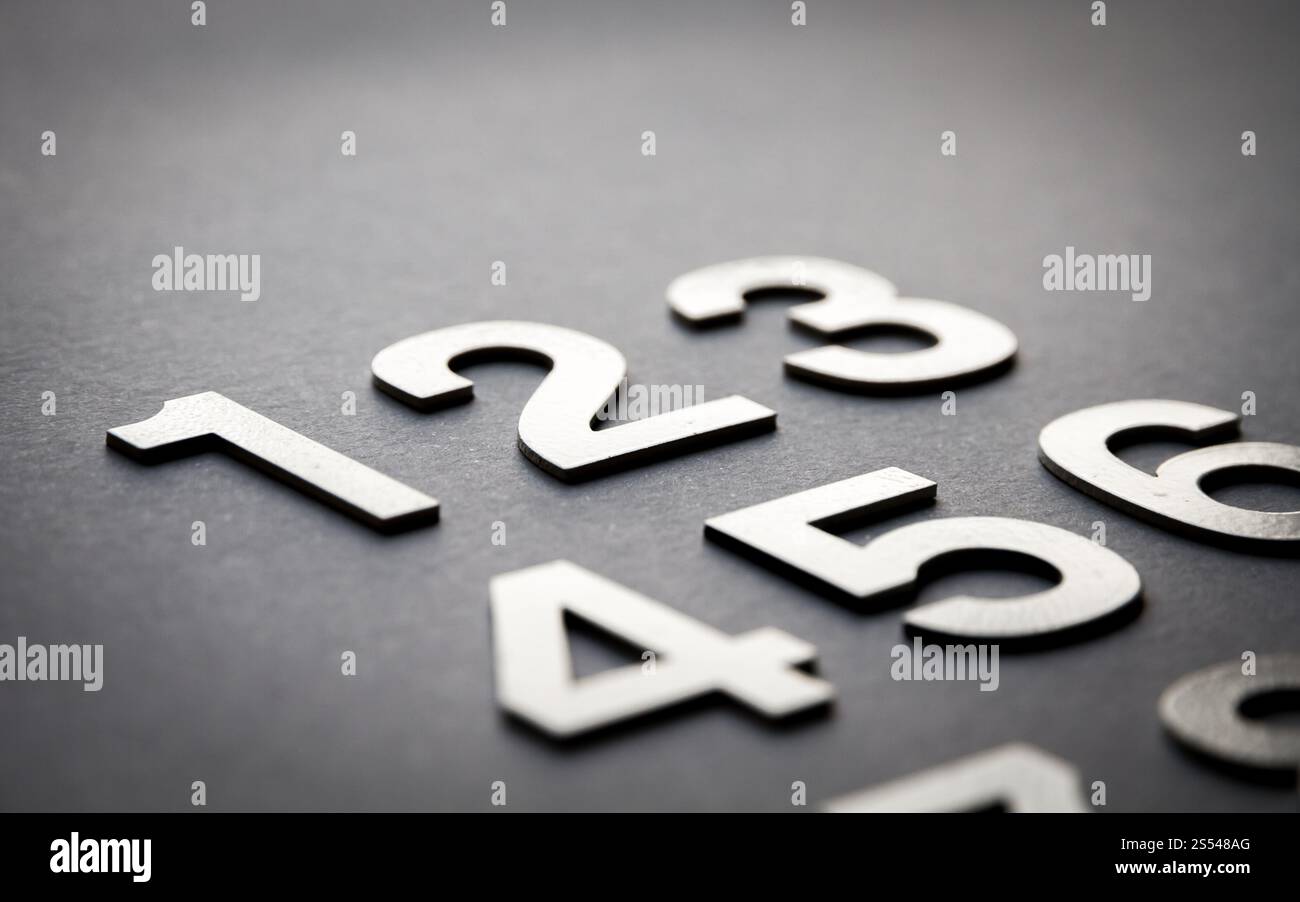 Mathematics background made with solid numbers from 1 to 9 - Closeup ...