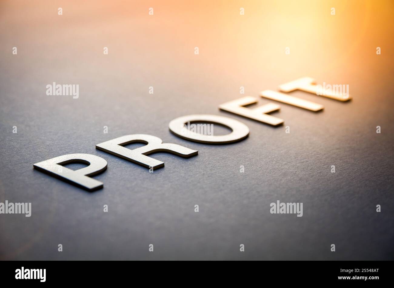 Word profit written with white solid letters on a board. Word profit ...