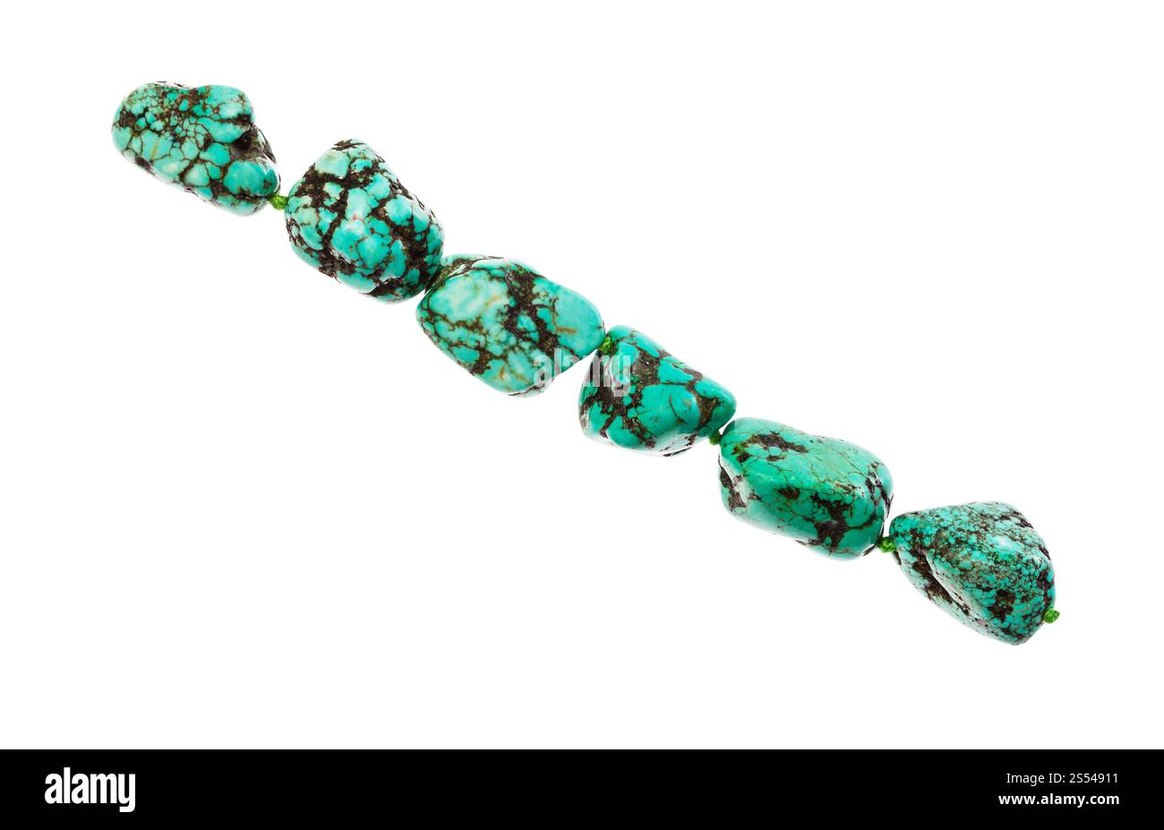 string of beads from natural tumbled colored howlite gemstone isolated ...