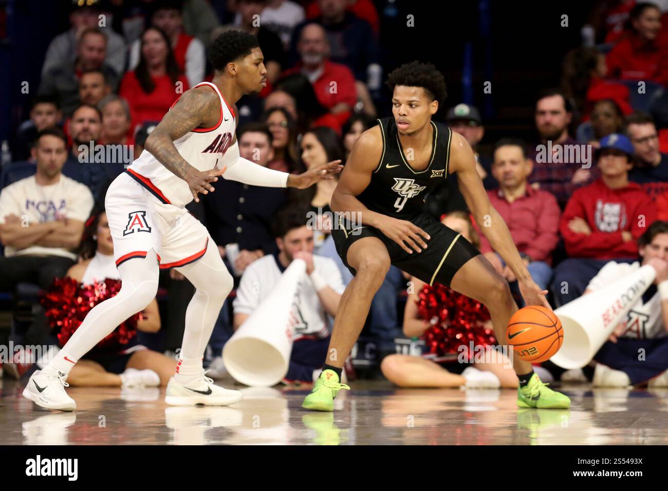 TUCSON, AZ - JANUARY 11: Arizona Wildcats guard Caleb Love #1 guards ...
