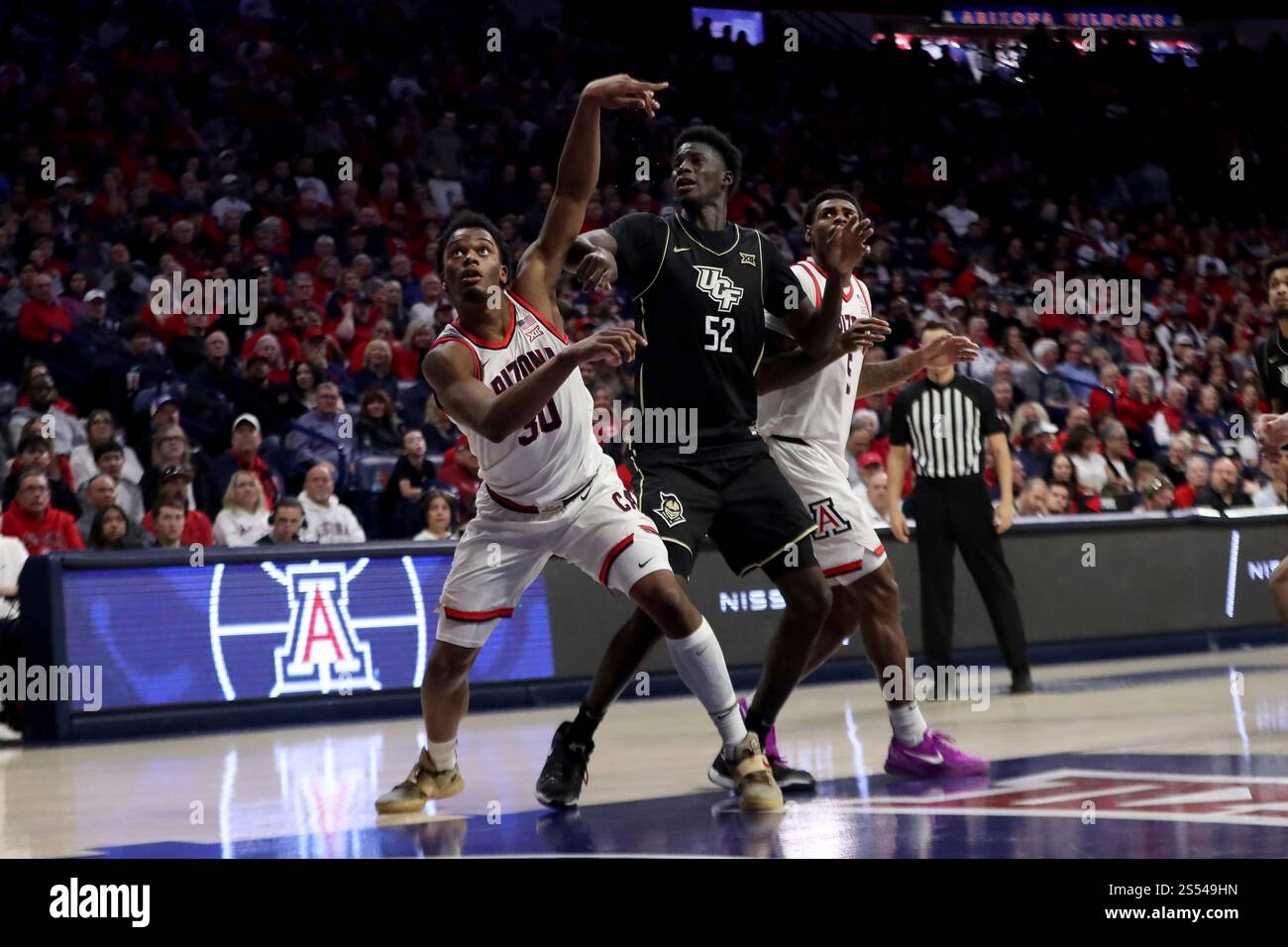 TUCSON, AZ - JANUARY 11: Arizona Wildcats forward Tobe Awaka #30 and ...