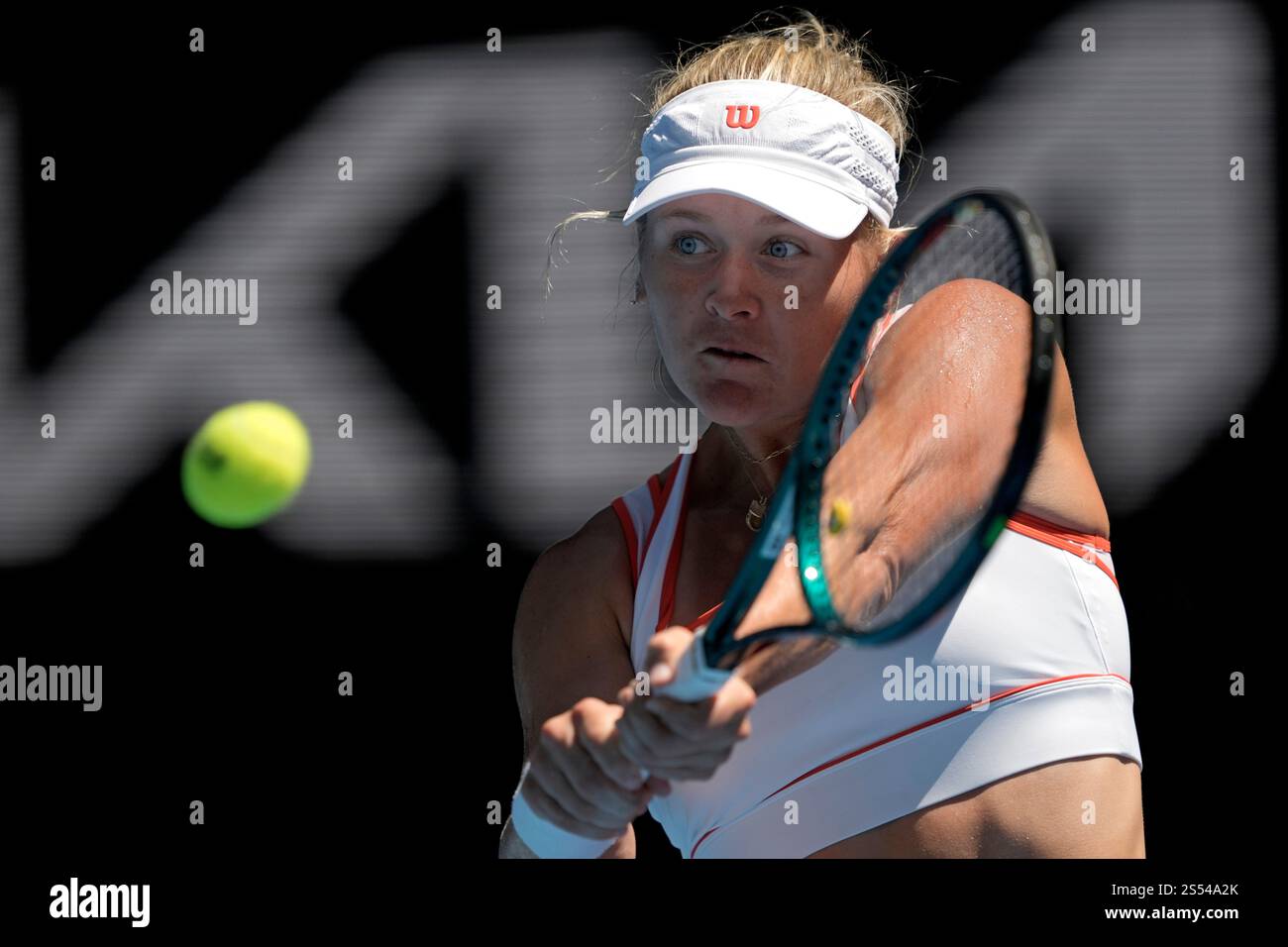 Peyton Stearns of the U.S. plays a backhand return to Emma Navarro of ...