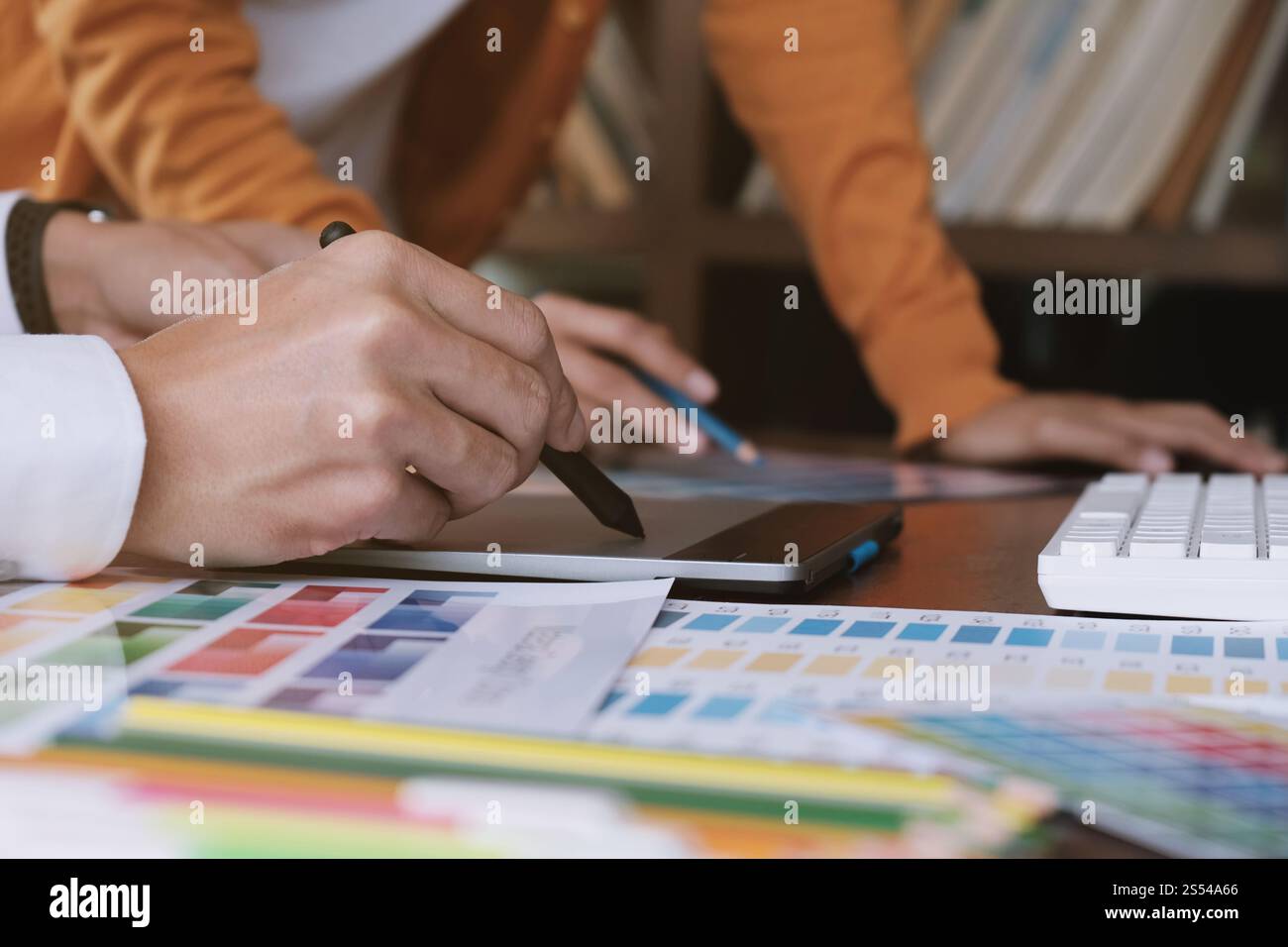Graphic designer working on digital tablet. artist drawing on graphic ...