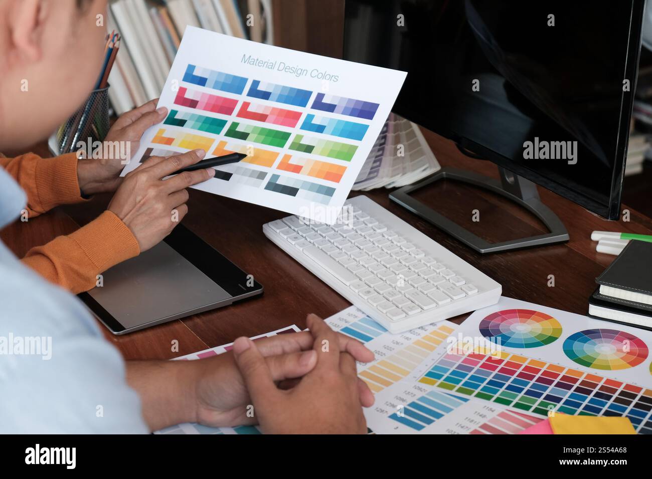 Graphic designer working on digital tablet. artist drawing on graphic ...