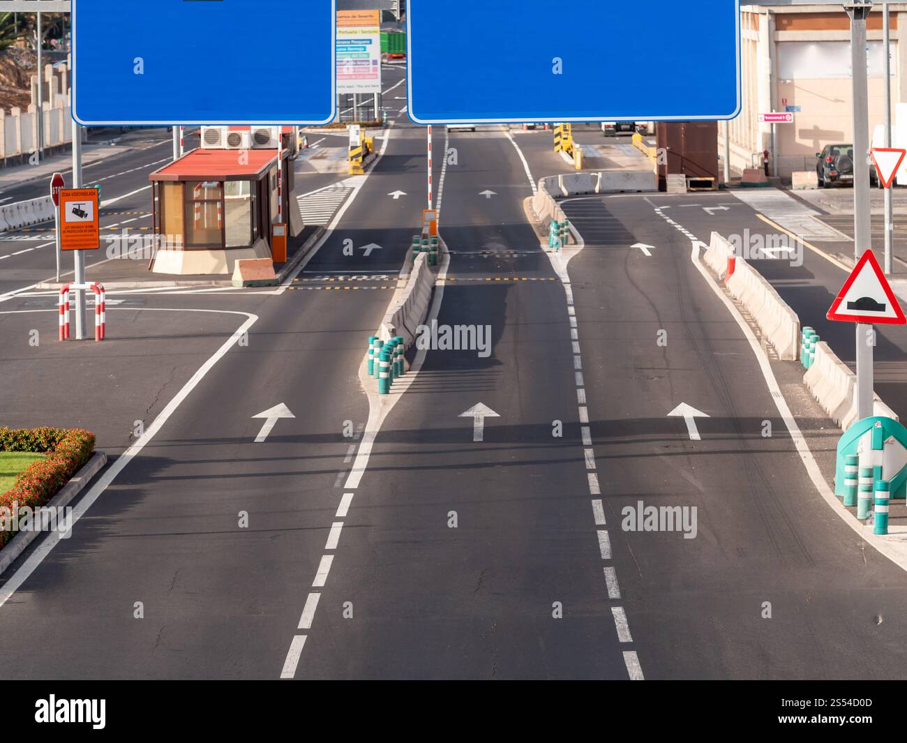 Photo of empty lanes on highway and blank road signs. Place for your ...