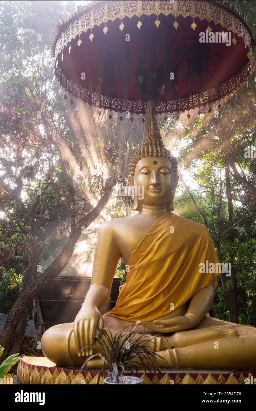 a Buddha at the Wat Wiang Kum Kam Temple in the city of Chiang Mai at ...