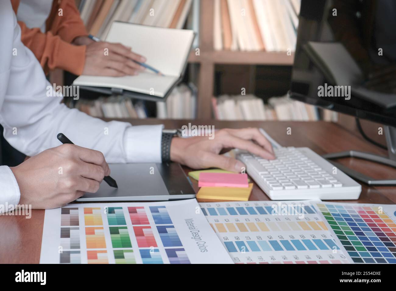 Graphic designer working on digital tablet. artist drawing on graphic ...