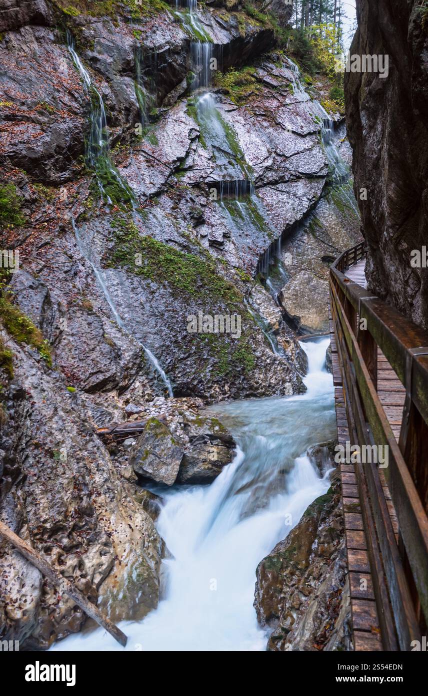 Mountain alpine autumn Wimbachklamm gorge and Wimbach stream with ...