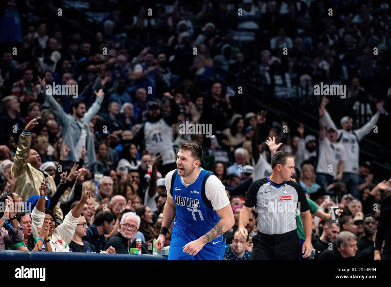 Dallas Mavericks guard Luka Doncic (77) celebrates after making a shot ...