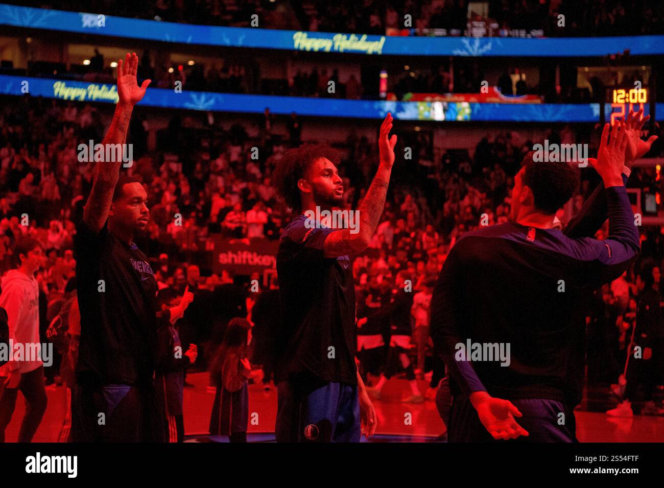 From left, Dallas Mavericks forward P.J. Washington and center Dereck ...