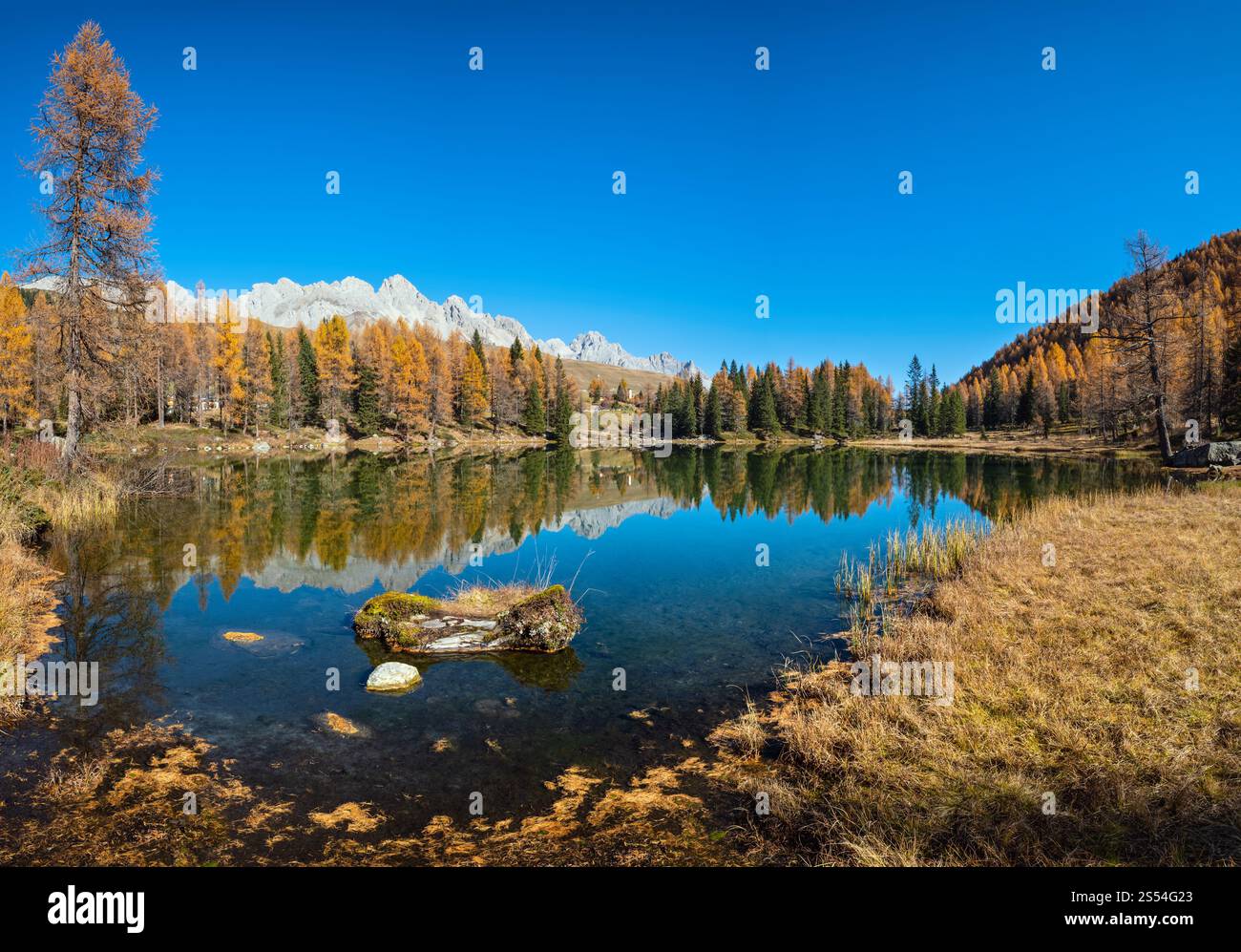 Autumn alpine mountain lake near San Pellegrino Pass, Trentino ...