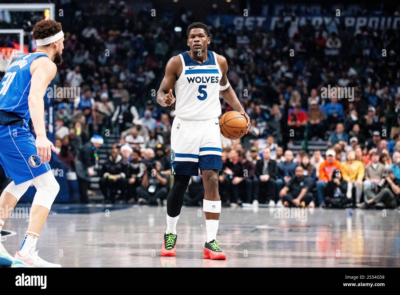 Minnesota Timberwolves guard Anthony Edwards (5) sets up a play during ...
