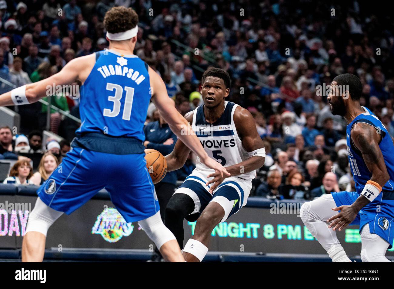 Minnesota Timberwolves guard Anthony Edwards (5) steps into a jump shot ...