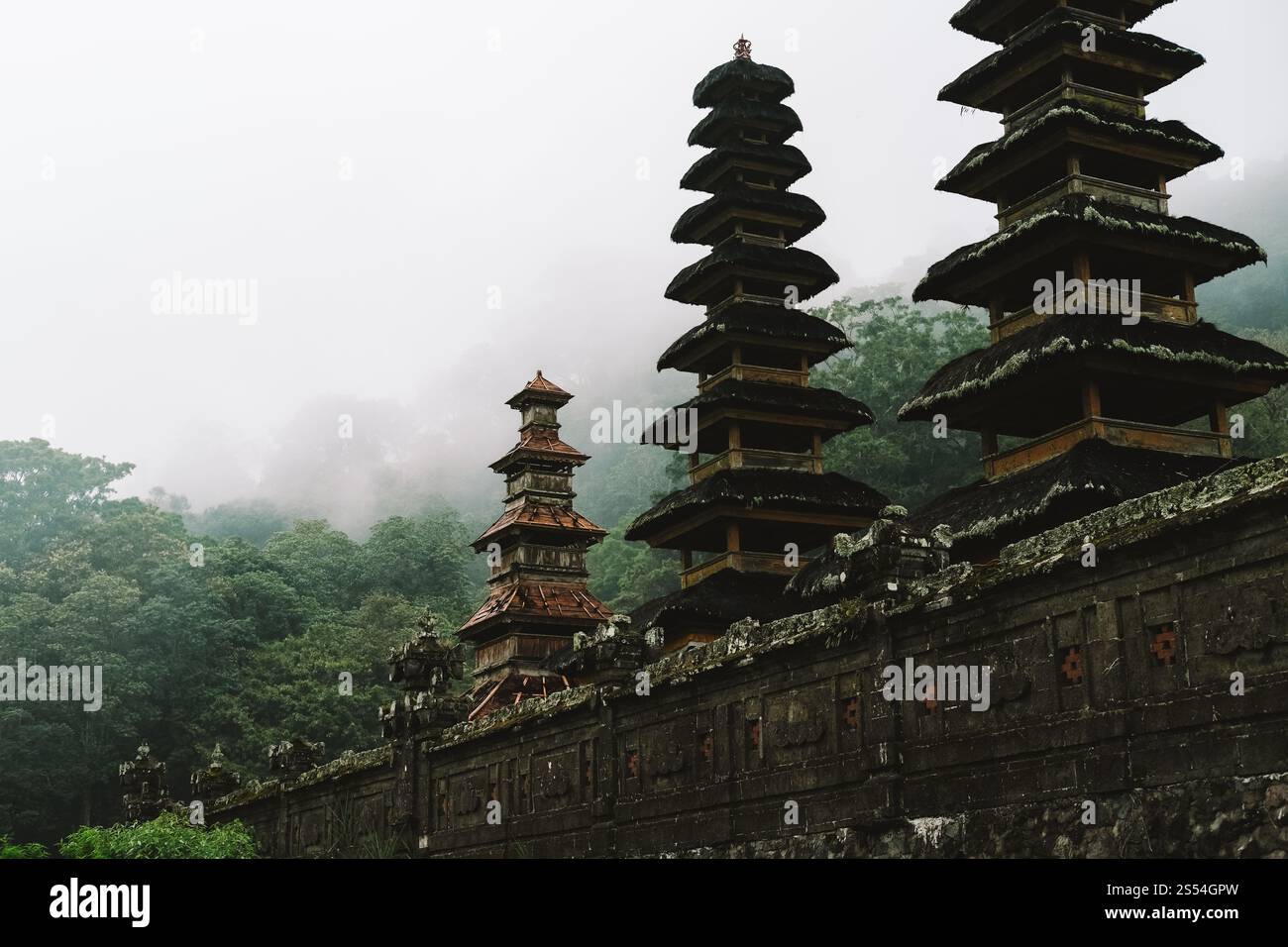 Bottom up view of ancient historical temple on Bali island. Dark ...