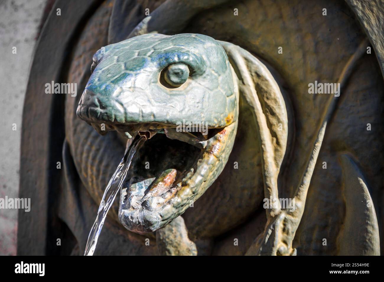 Snake sculpture fountain detail in Paris, France. Snake fountain detail ...